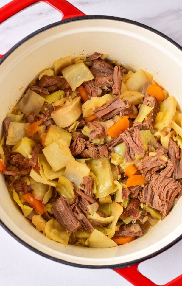 Healthy Cabbage Stew Recipe with Beef in Dutch Oven on Stove