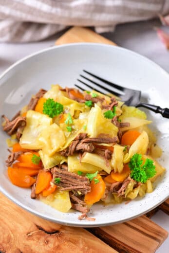 Healthy Cabbage Stew Recipe with Beef in Dutch Oven on Stove